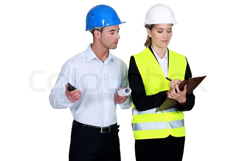 Engineer peering over shoulder | Stock image | Colourbox