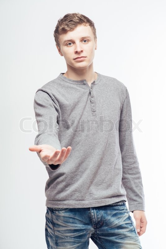 Man stretches out his hand | Stock image | Colourbox