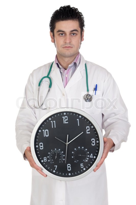 Doctor with big clock isolated on white ... | Stock image | Colourbox