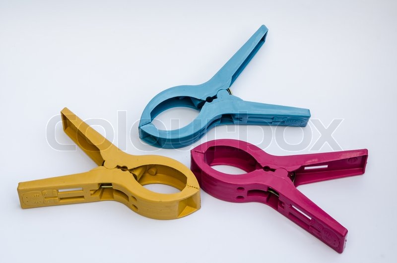 Close up three Colorful Plastic Clamps ... | Stock image | Colourbox