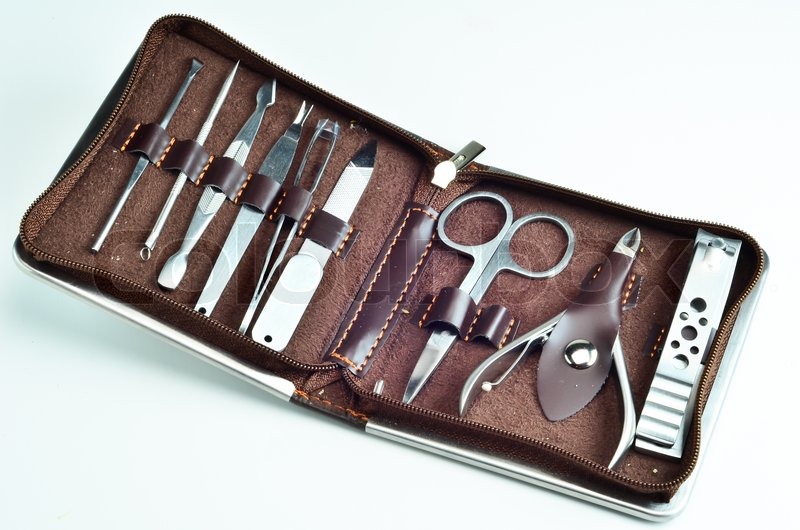 Manicure Tools Set In Brown Pocket | Stock image | Colourbox