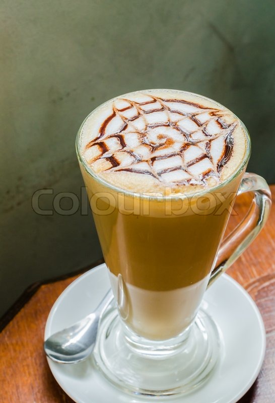 Cappuccino coffee with chocolate on top | Stock image | Colourbox