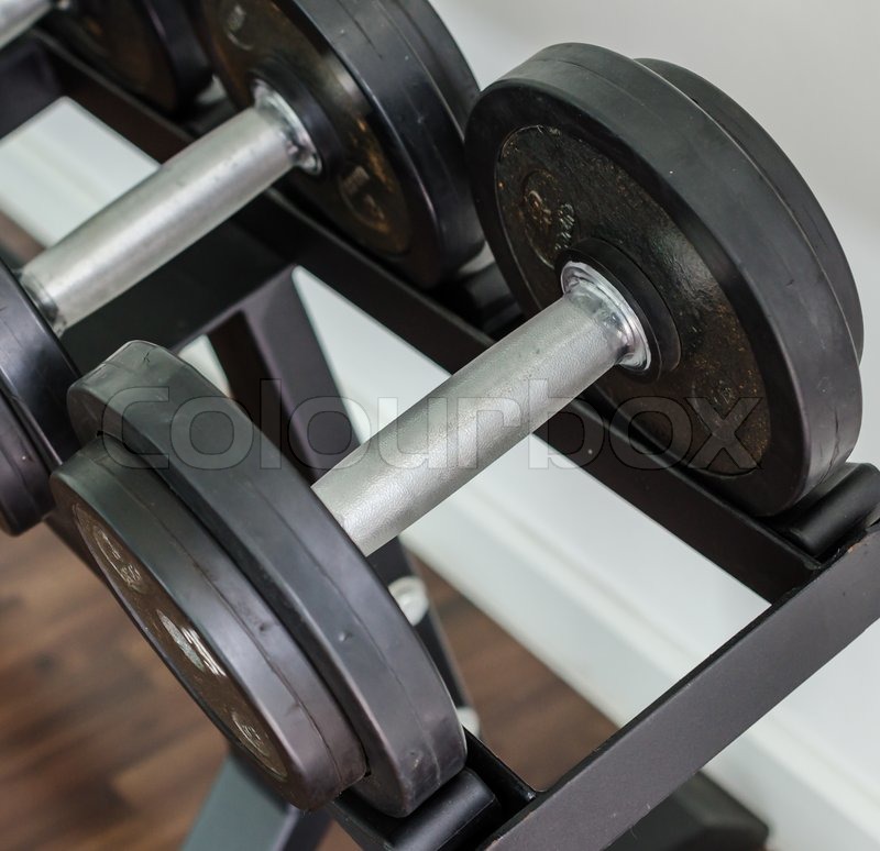 Dumbbell in exercise for fitness | Stock image | Colourbox