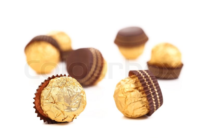 Bunch of chocolate gold bonbons. ... | Stock Photo | Colourbox