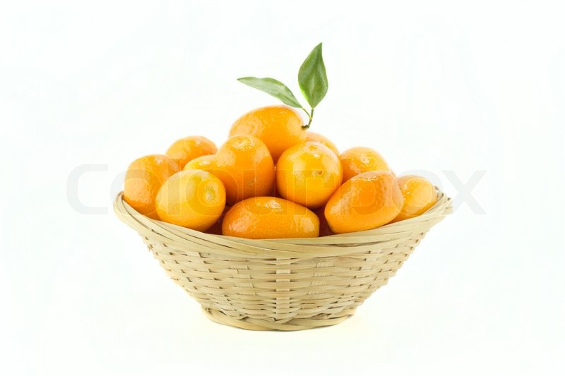 Sweet Small Orange Fruit with leaves in ... | Stock Photo | Colourbox