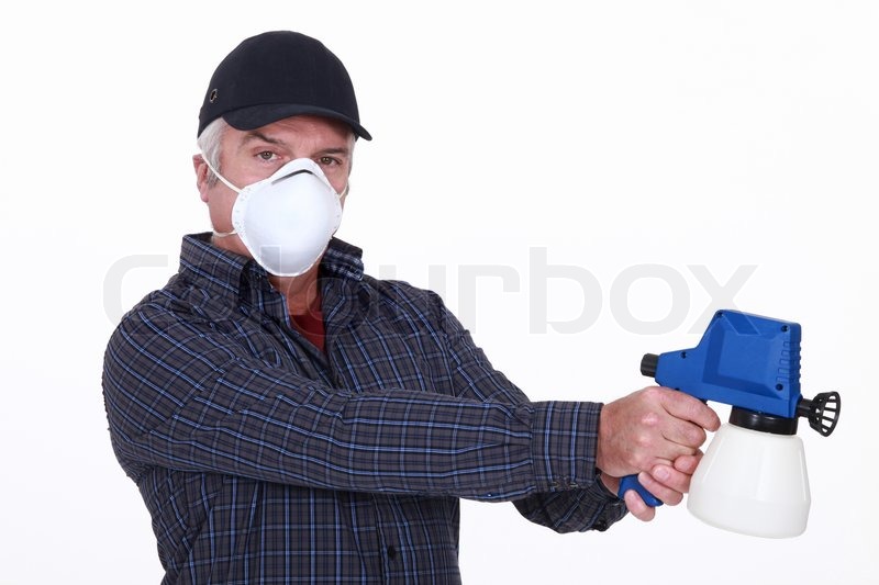Man with a paint sprayer | Stock image | Colourbox