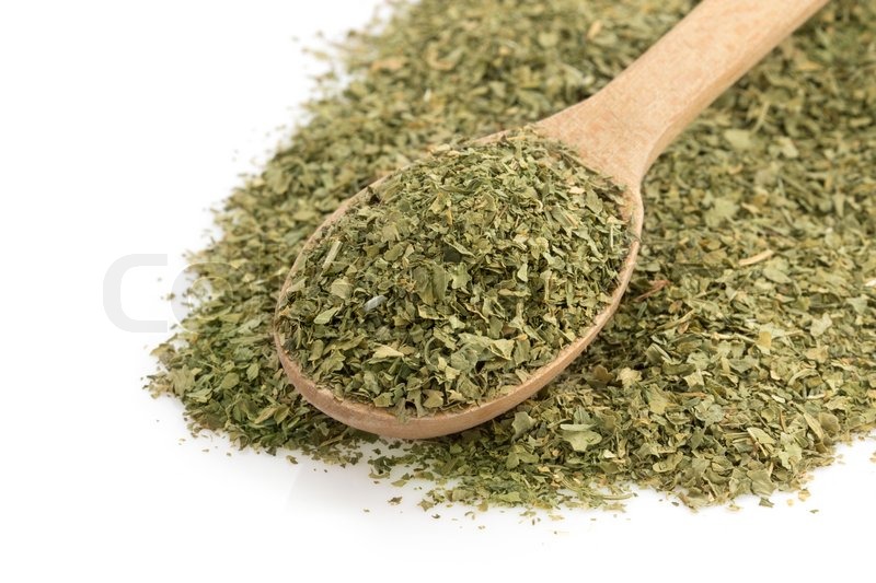 Dried green spices in spoon isolated on ... | Stock Photo | Colourbox