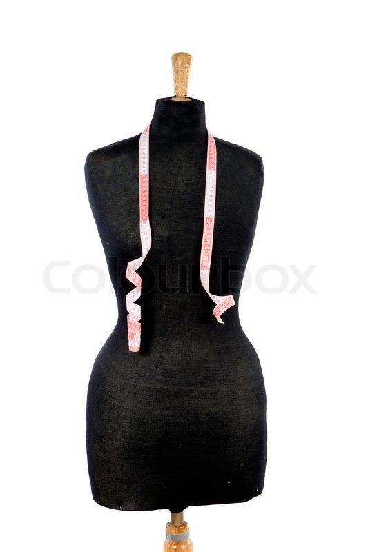 Mannequin with a tape measure a over ... | Stock image | Colourbox