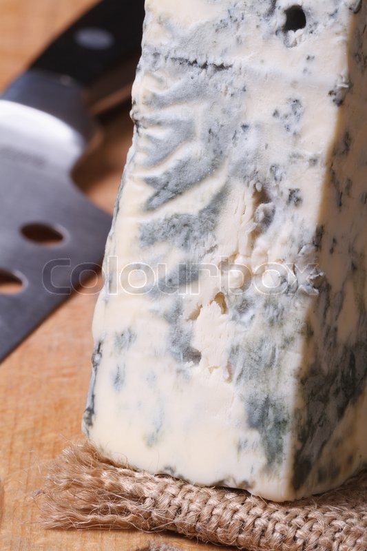 Blue cheese close-up on a kitchen ... | Stock Photo | Colourbox