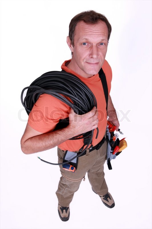 Electrician standing on white ... | Stock image | Colourbox