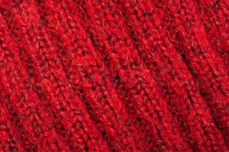 Handmade knit red background. Close up ... | Stock image | Colourbox