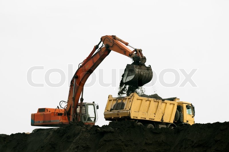Excavator loading truck. White isolated | Stock image | Colourbox