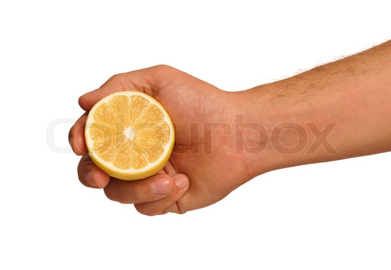 Man hand with fresh lemon isolated on ... | Stock Photo | Colourbox