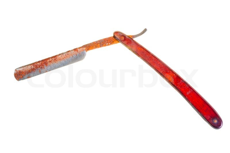 Old rusty razor on a white background | Stock image | Colourbox