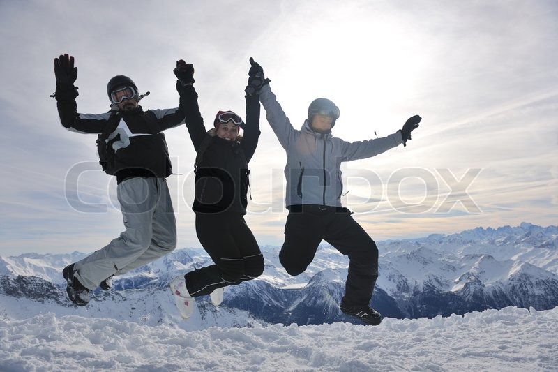Happy people group have fun on snow at ... | Stock image | Colourbox