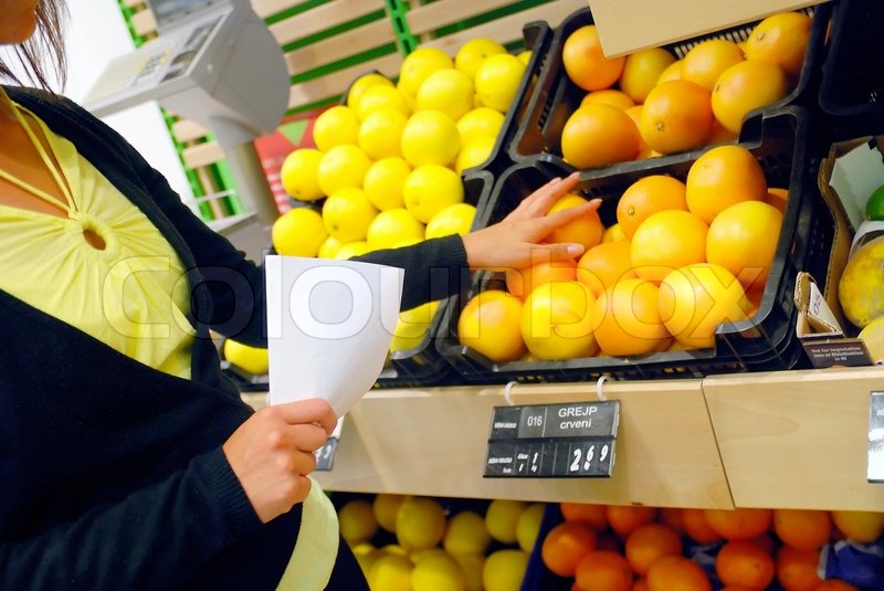 Buying food in supermarket | Stock image | Colourbox