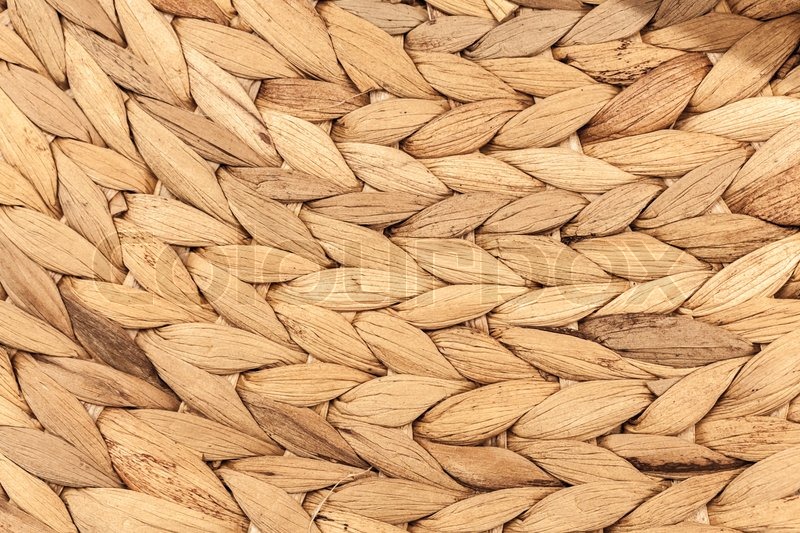 Braided wooden background. Closeup ... | Stock image | Colourbox