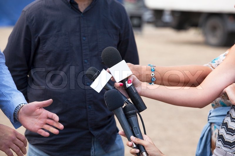 A journalist is making a interview with ... | Stock image | Colourbox