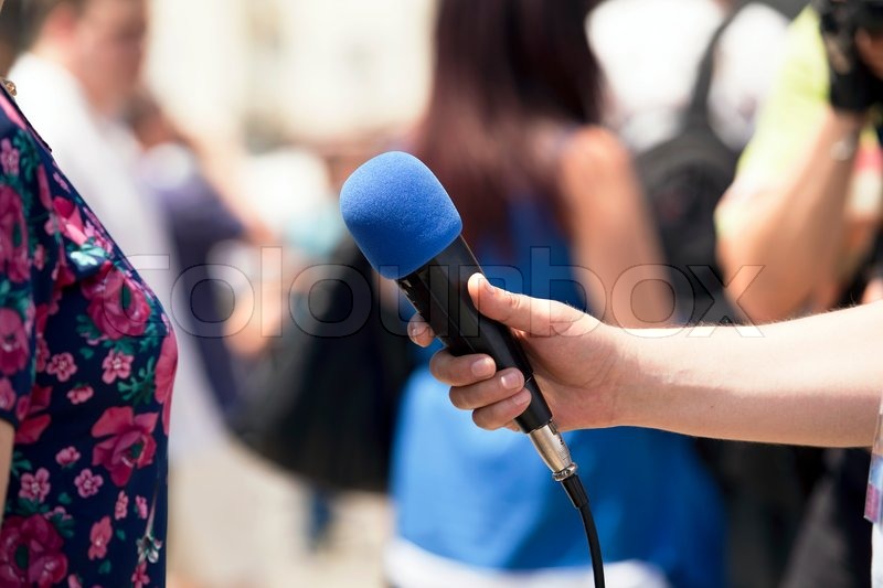 A journalist is making a interview with ... | Stock image | Colourbox