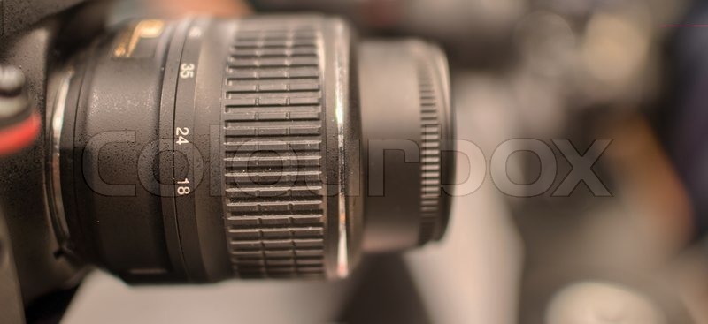 Photocamera lens, side view. | Stock image | Colourbox