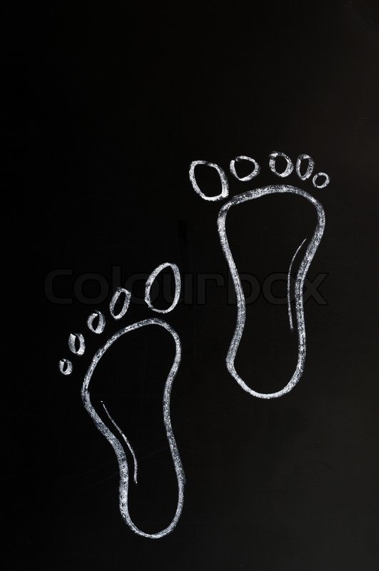 Footprints drawn with white chalk on a ... | Stock image | Colourbox