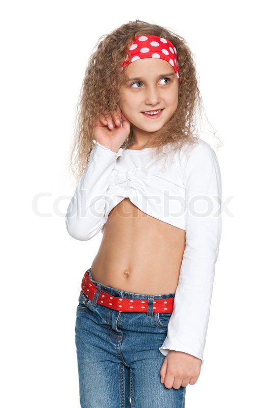 A smiling little girl imagines on the ... | Stock image | Colourbox