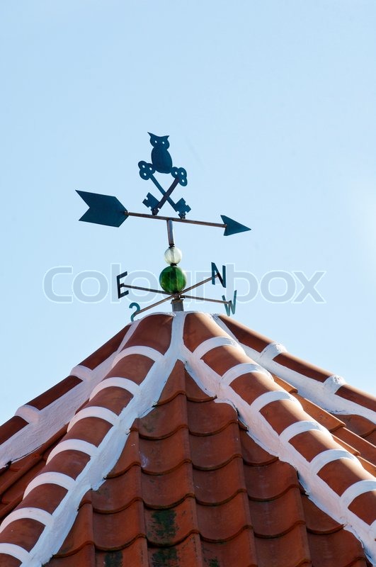 Weather compass on a roof | Stock image | Colourbox