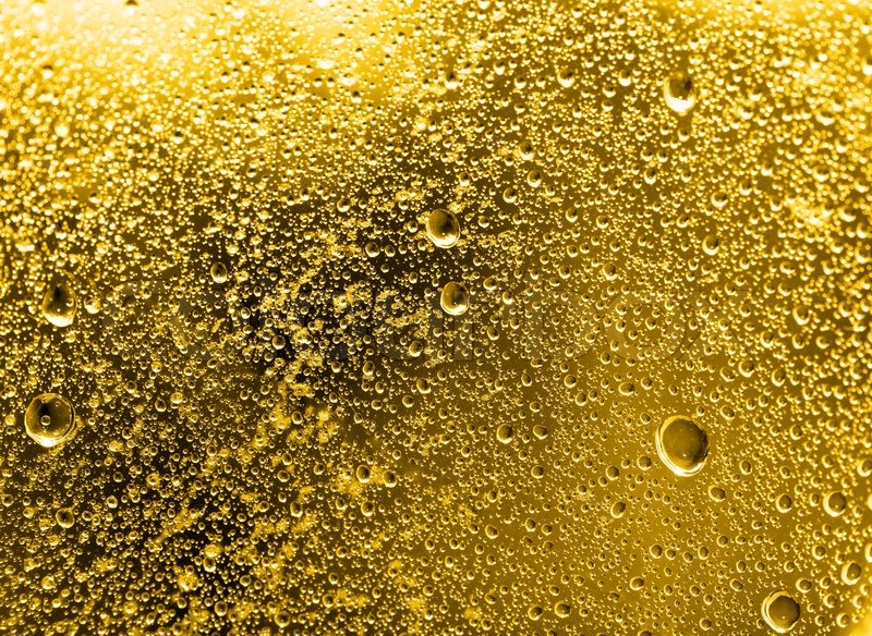 Water drops on a gold background. macro | Stock image | Colourbox