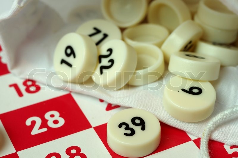 Bingo pieces and numbers on bingo board | Stock image | Colourbox