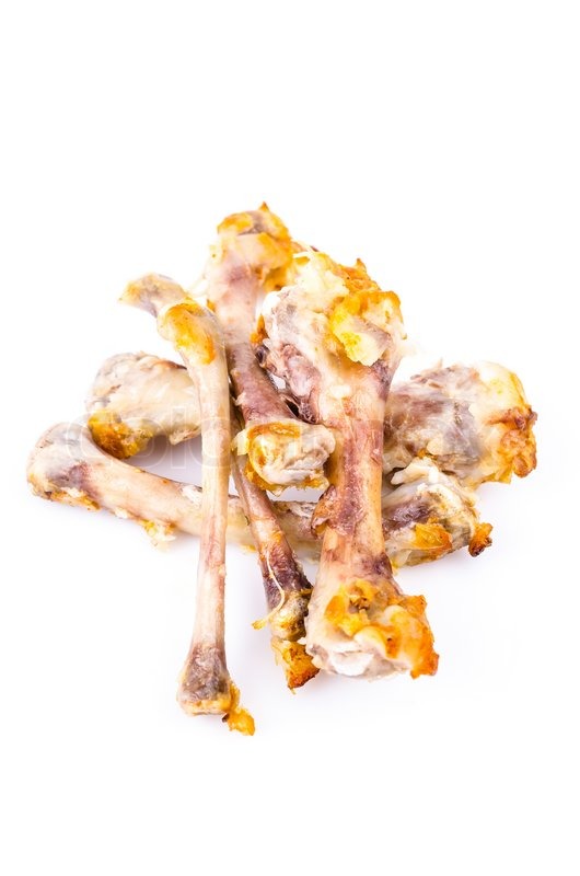 Chicken wings bones on white background | Stock image | Colourbox