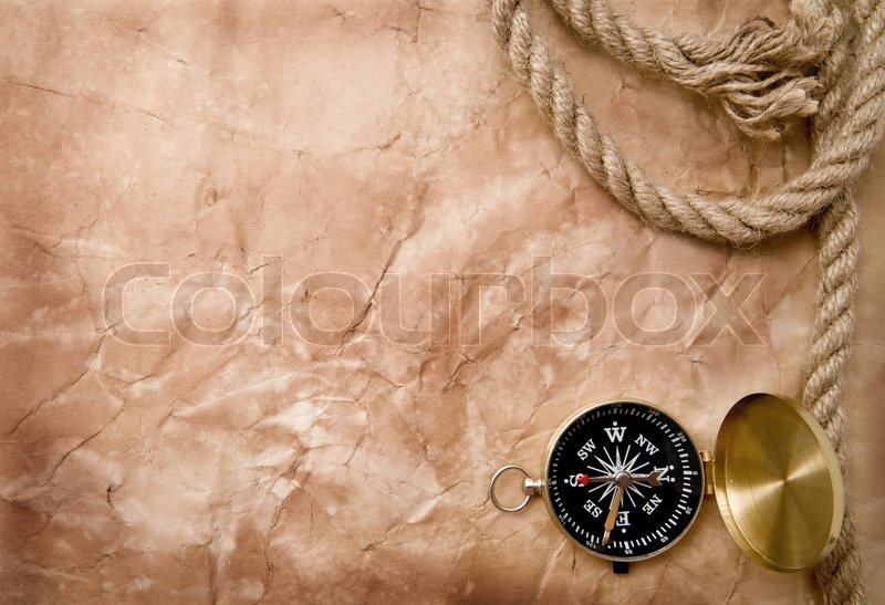 Compass and rope on a background an old ... | Stock Photo | Colourbox