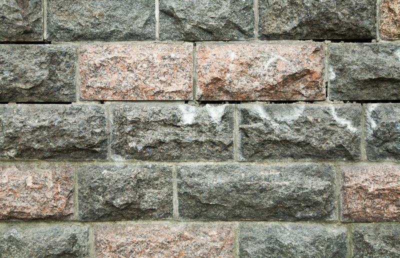 Wall from a granite as a background | Stock image | Colourbox