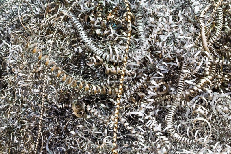 Close up twisted metal scrap from lathe ... | Stock image | Colourbox