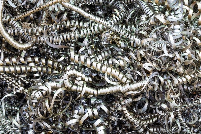 Close up twisted metal scrap from lathe ... | Stock image | Colourbox