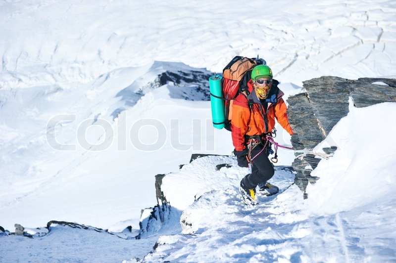 Climber on the snowy mountains | Stock image | Colourbox