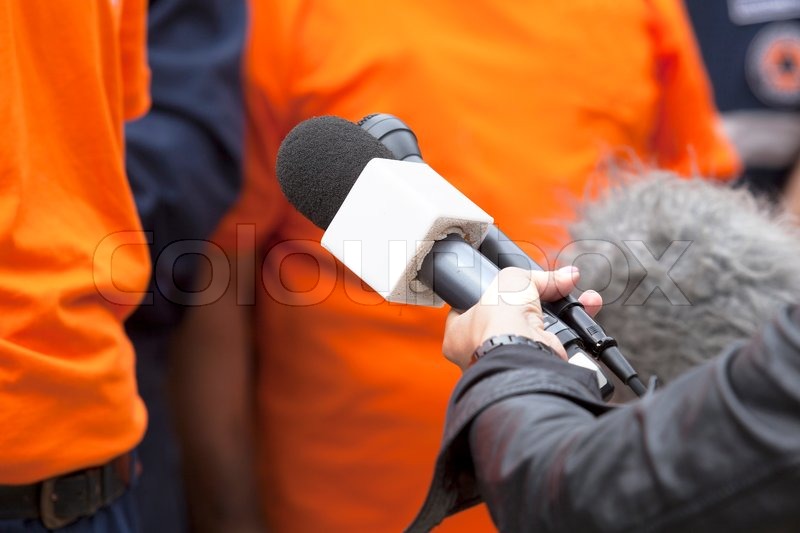 A journalist is making an interview ... | Stock image | Colourbox