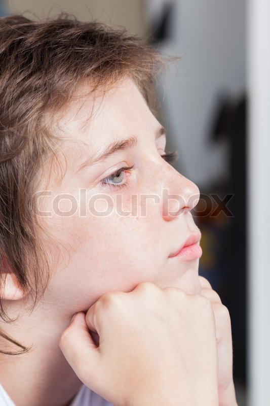 Unhappy sad boy, face close up portrait ... | Stock image | Colourbox