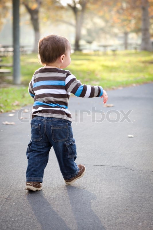 Happy Young Baby Boy Walking in the ... | Stock image | Colourbox