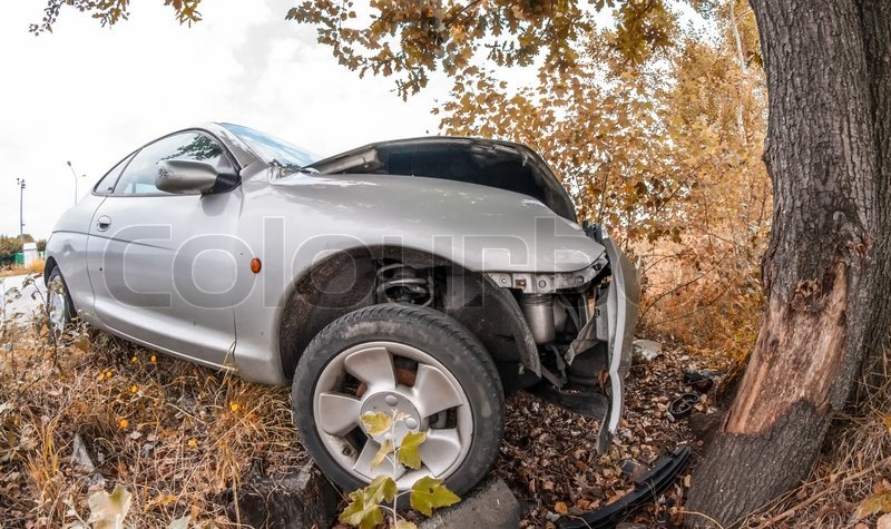 Road accident car crash againsta a tree ... | Stock image | Colourbox