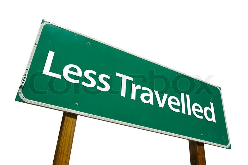 Less Travelled Green Road Sign Isolated ... | Stock image | Colourbox