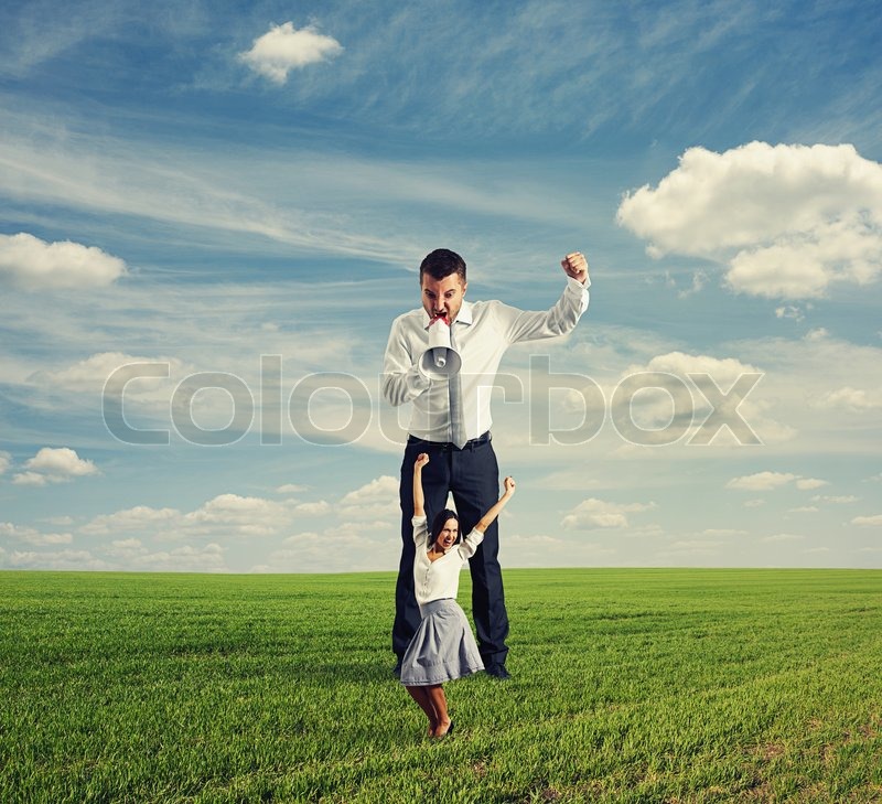 Aggressive man screaming at dancing ... | Stock image | Colourbox