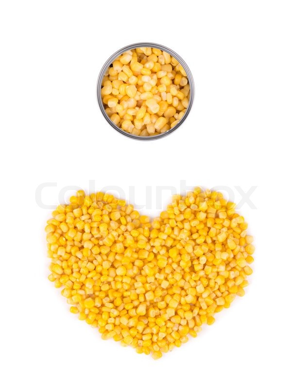 Heart shape of canned corn. Isolated on ... | Stock image | Colourbox