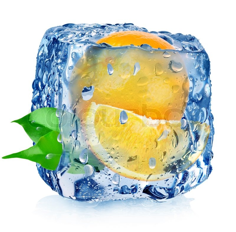 Orange in ice cube with drops isolated ... | Stock image | Colourbox